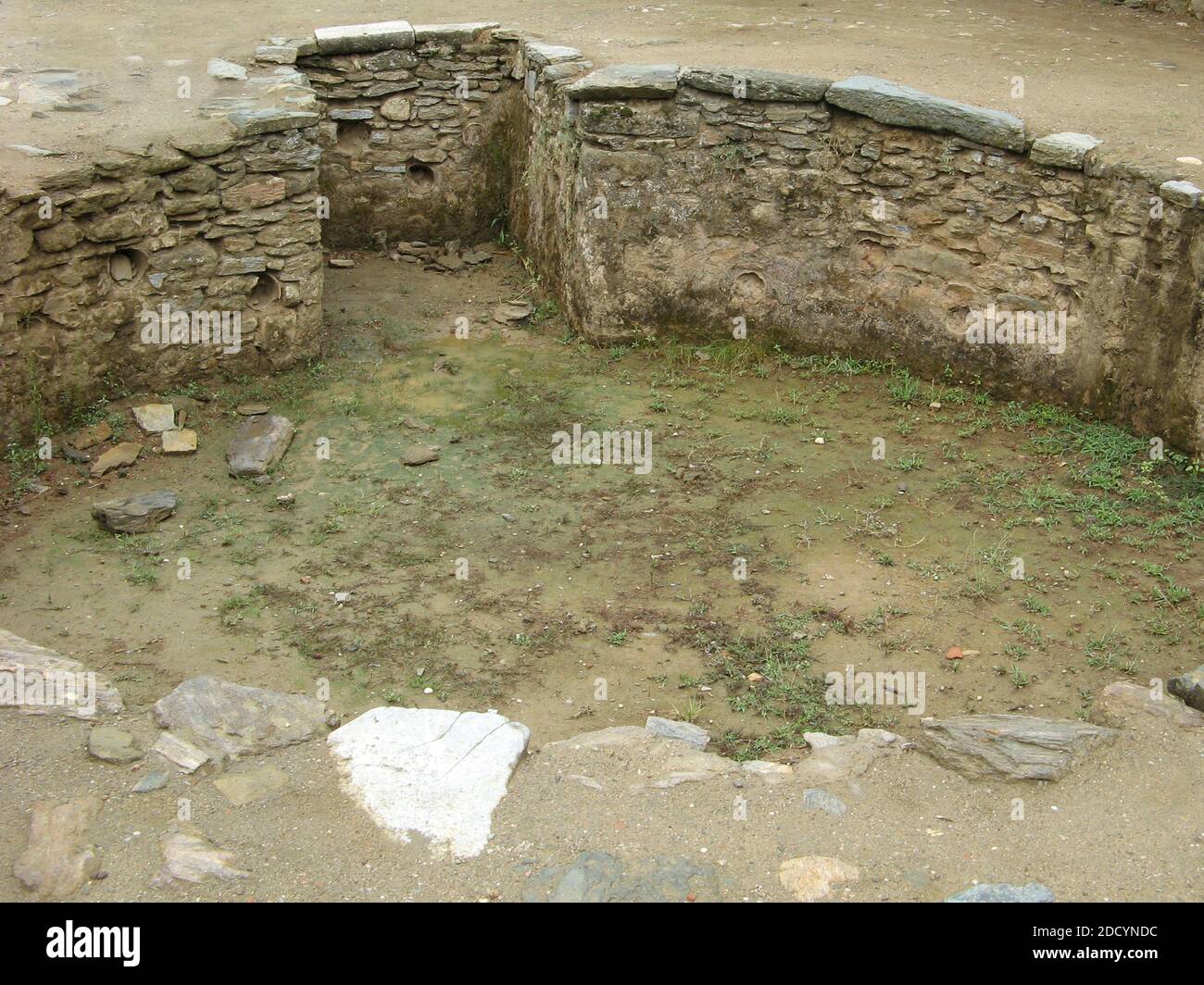 The key hole-shaped baptismal pool on the way to the House of The ...