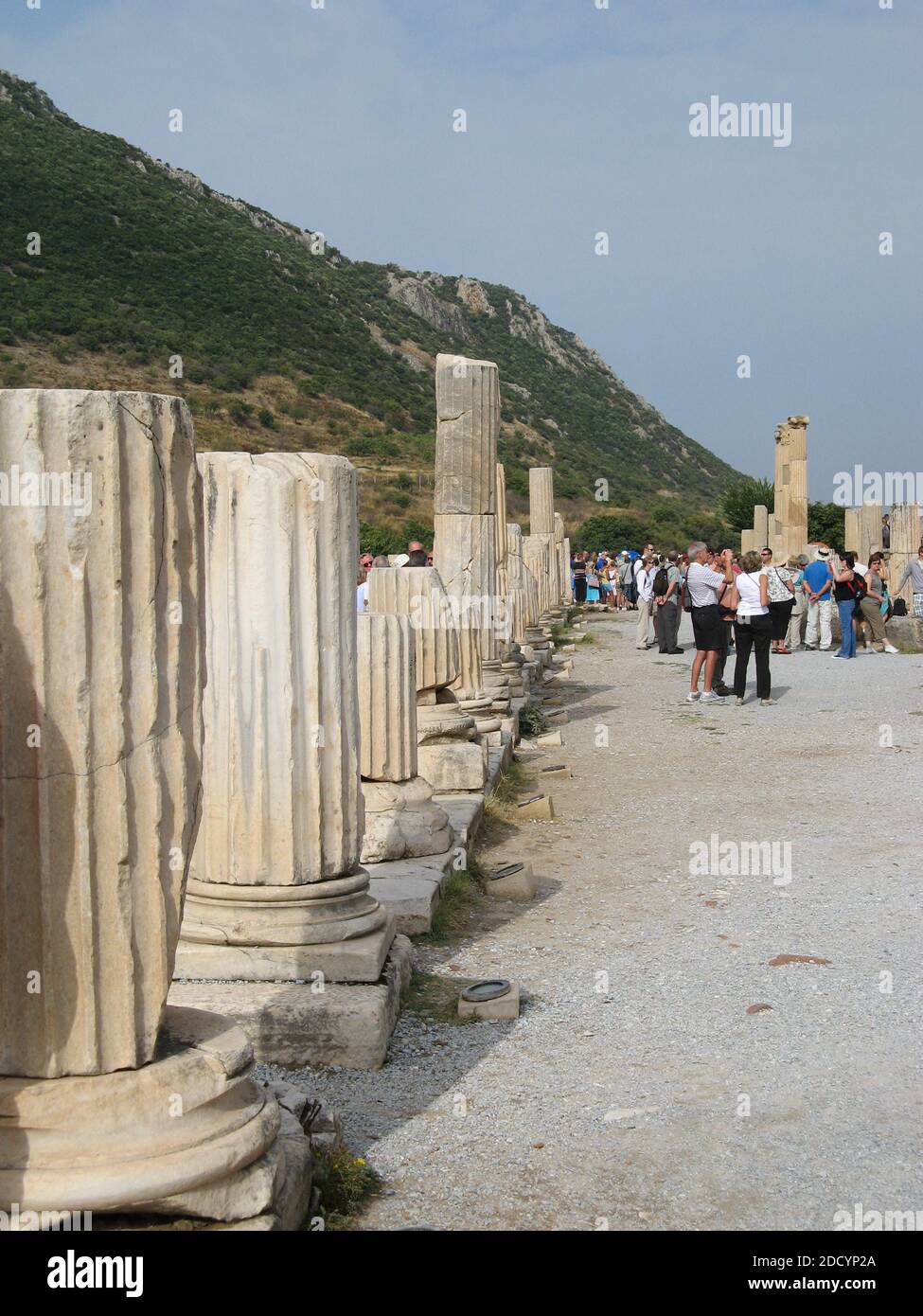 Tourists walk along Curetes Street in the Ancient City of Ephesus in ...