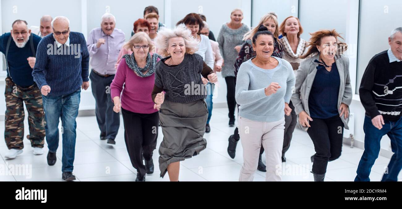 a group of retirees are running for retirement. group of older p Stock ...