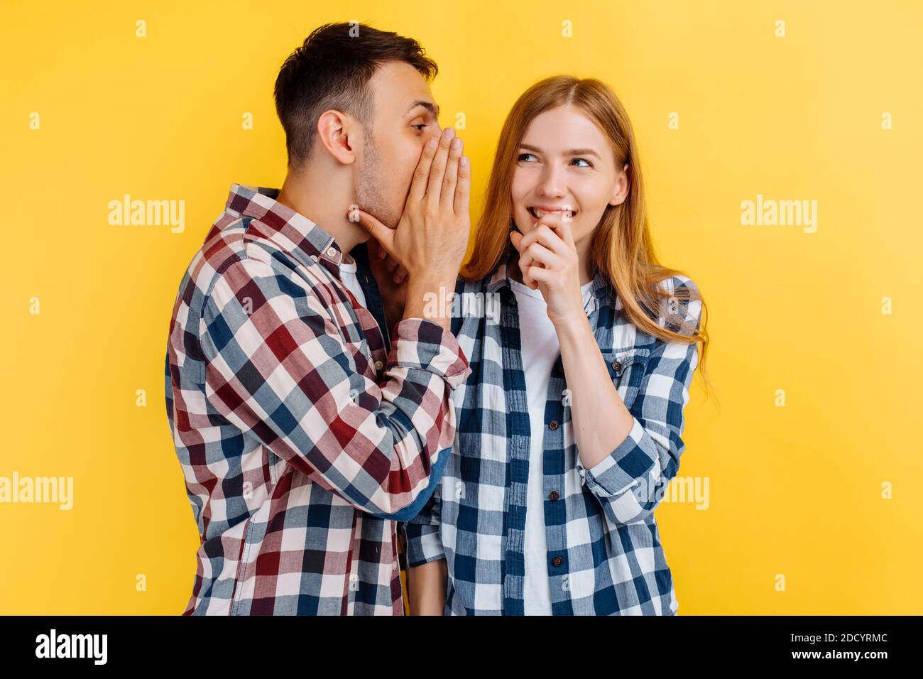 young people, man and woman, gossiping on a white background Stock ...