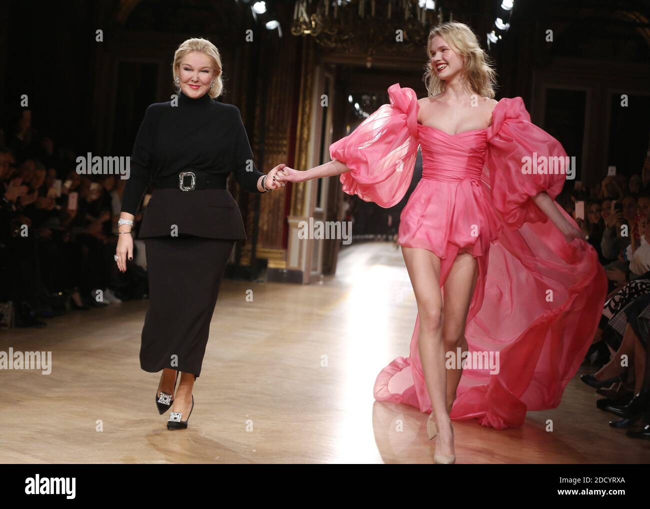 Designer Yanina and a model walks the runway during the Yanina Haute ...