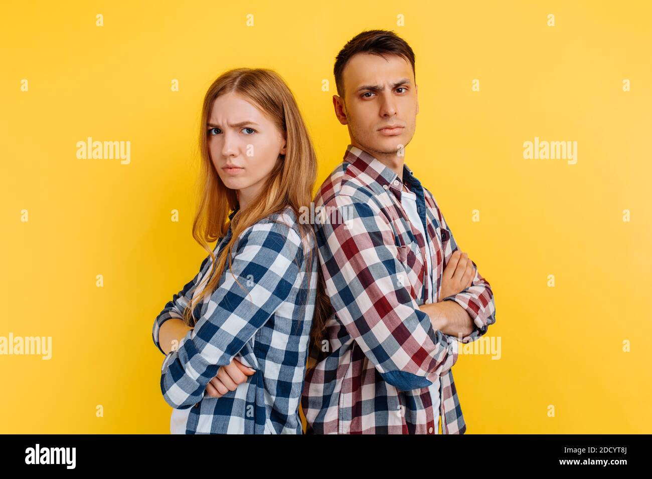 Two angry people back to back hi-res stock photography and images - Alamy
