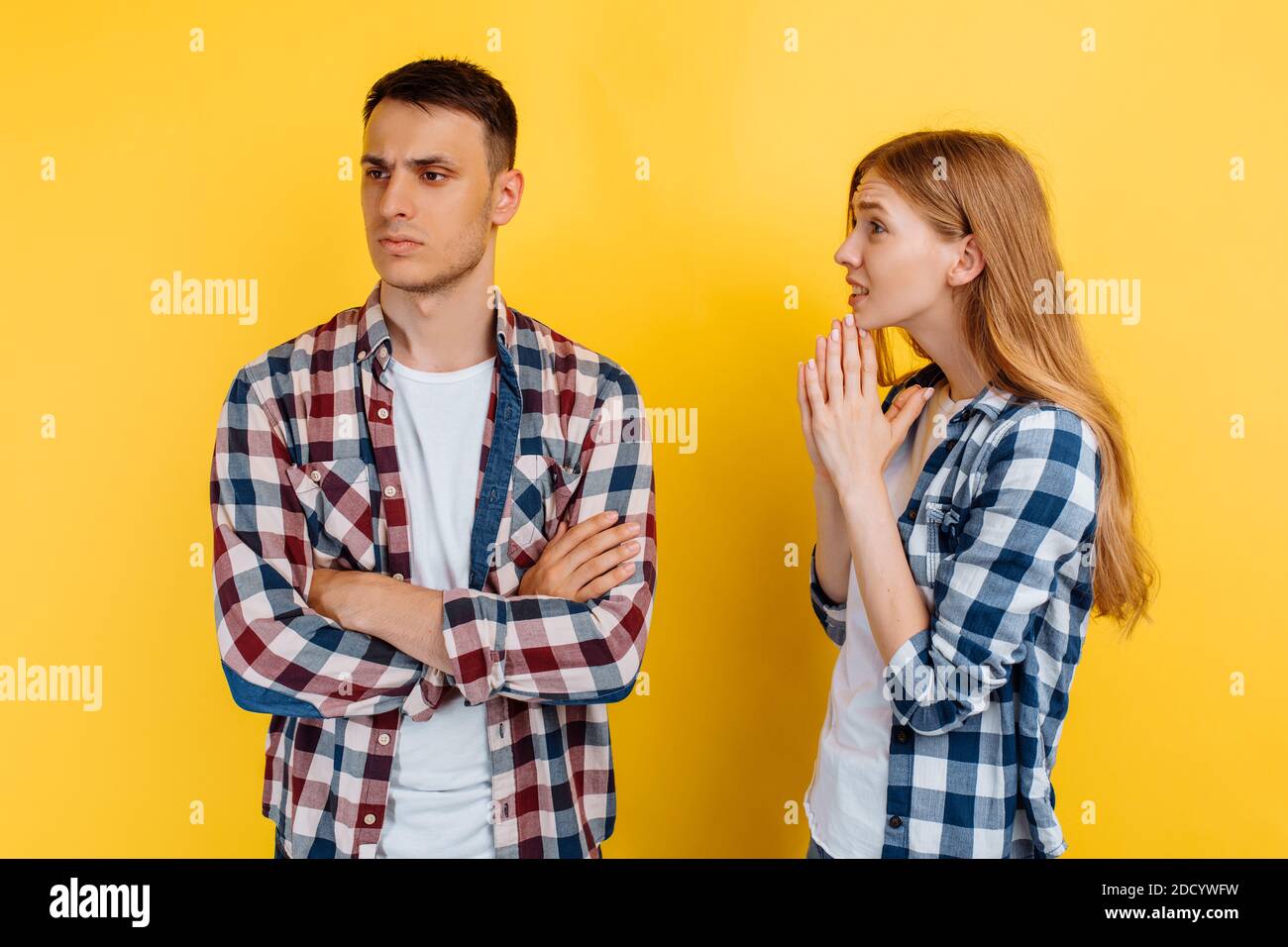 Woman begs man hi-res stock photography and images - Alamy