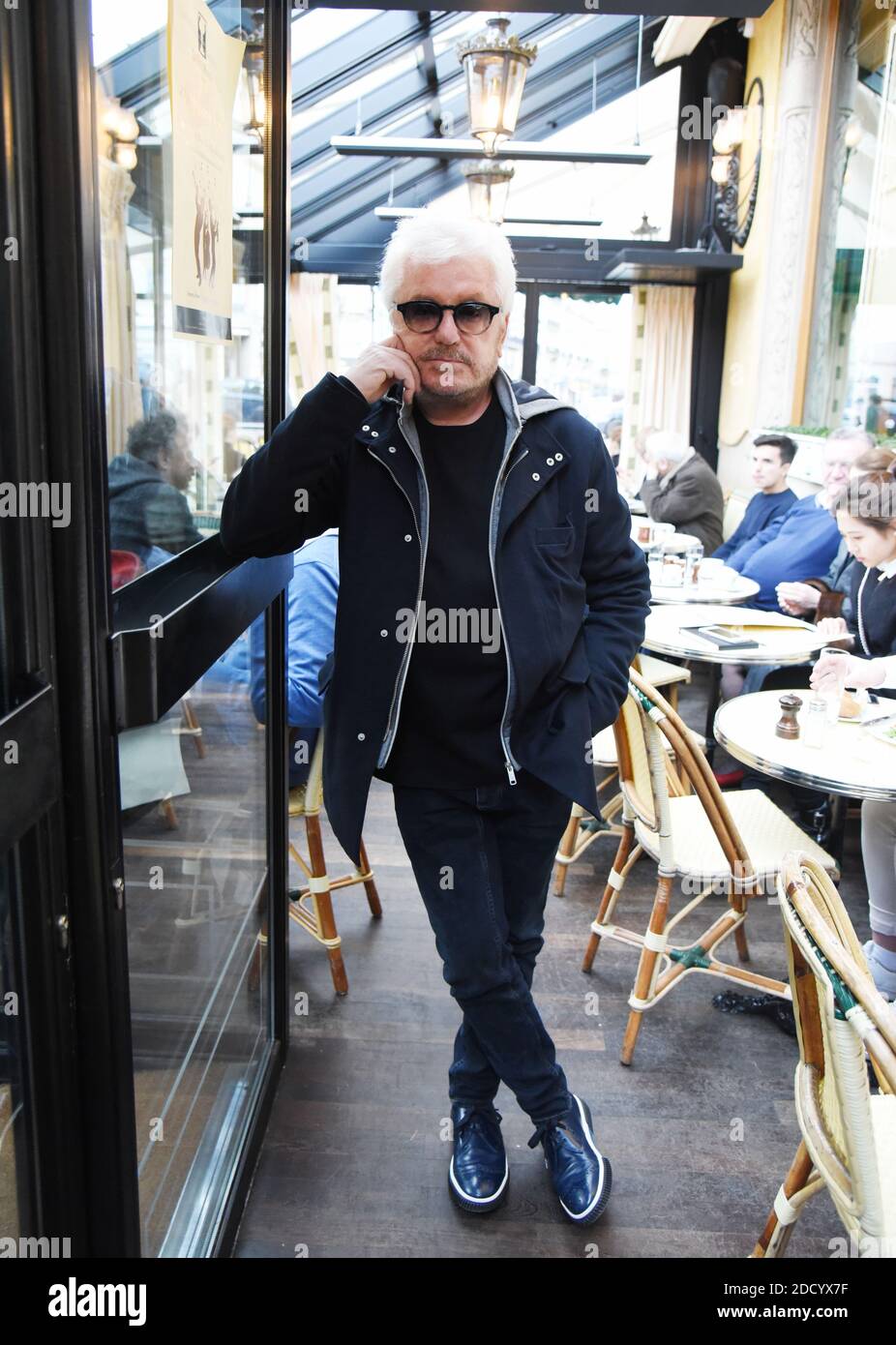 Marc Cerrone posing in the restaurant "Deux Magots" where he exhibits ...