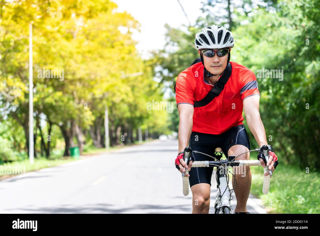 Asian male cyclist hi-res stock photography and images - Alamy