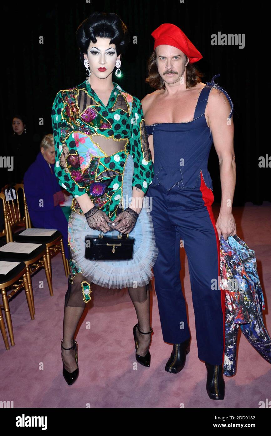 Casey Spooner and guest attending the Viktor and Rolf show as part of ...