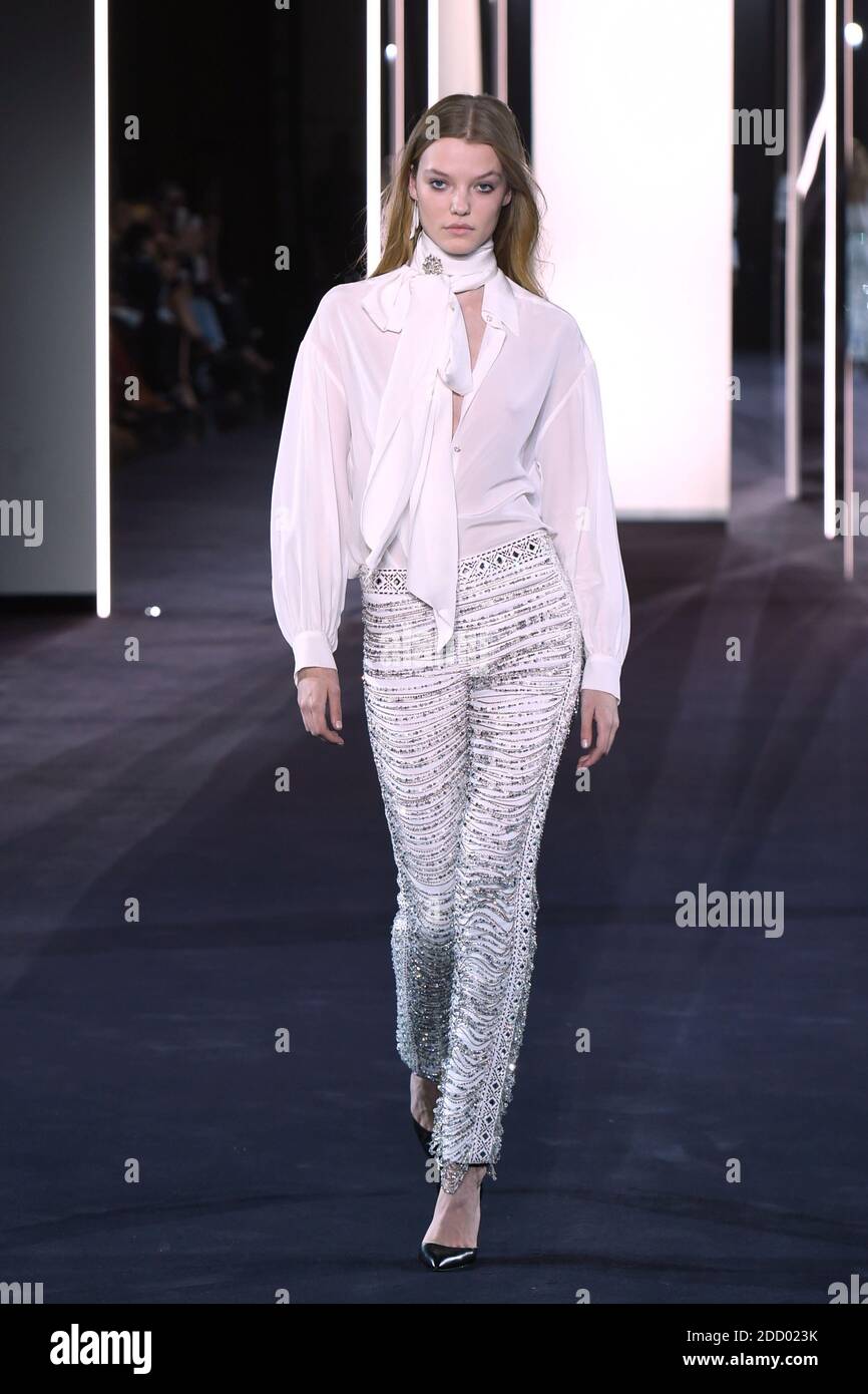 A model walks the runway during the Azzaro Couture show as part of ...