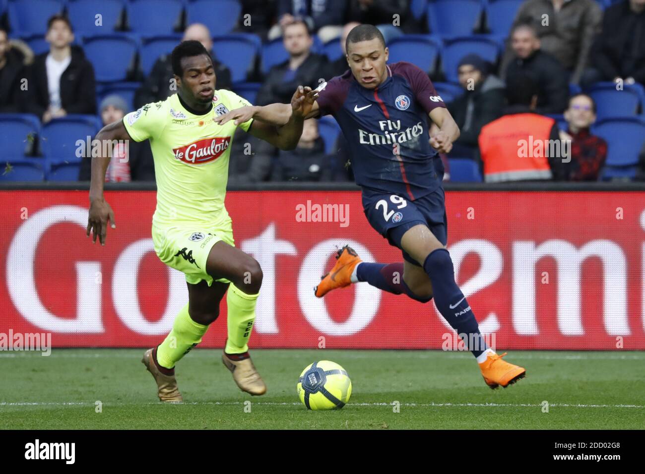 PSG's Kylian Mbappe battling Angers's Lassana Coulibaly during the ...