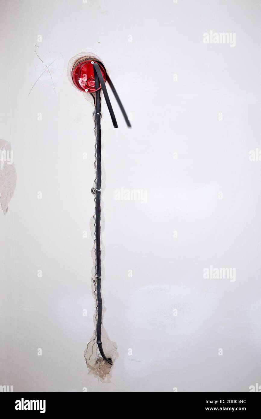 the electrical wire and the socket are inserted into the grooved groove ...