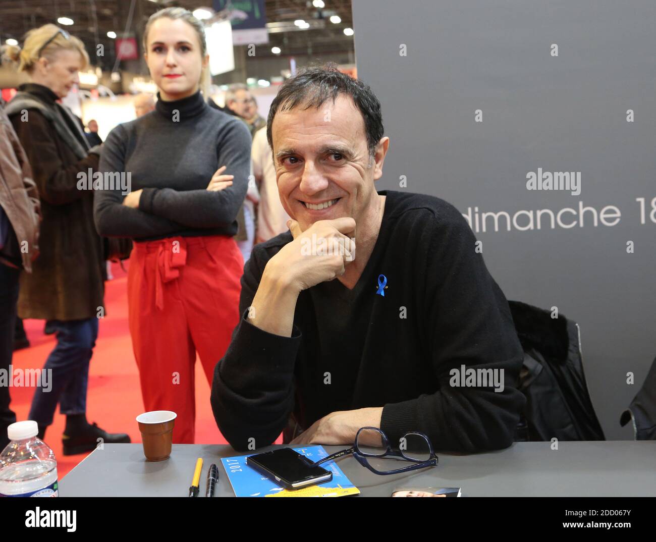 French stage actor and tv presenter Thierry Beccaro signs during the ...