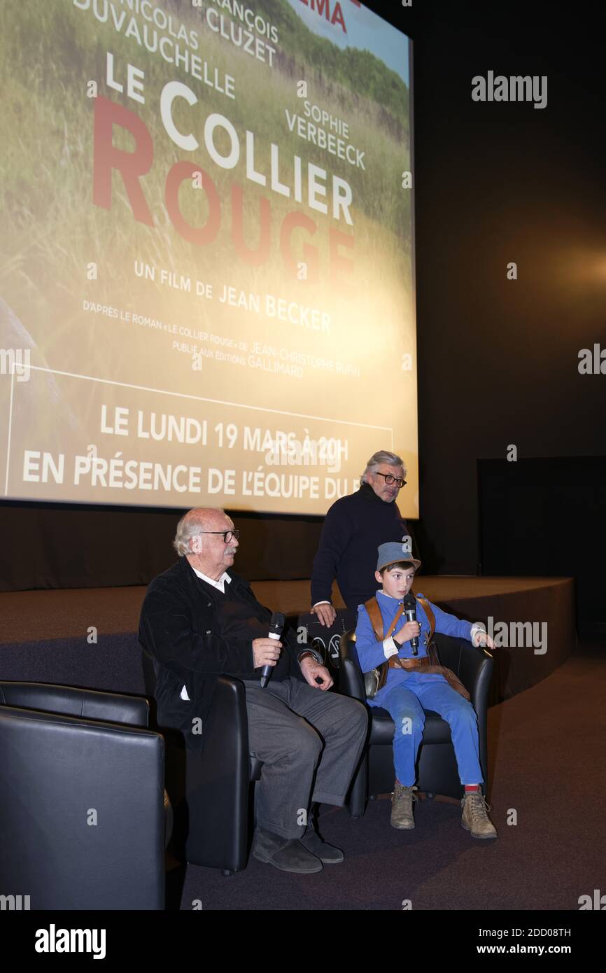 , Jean Becker (left) talking with Gwendal Legivre an 11-year-old boy ...