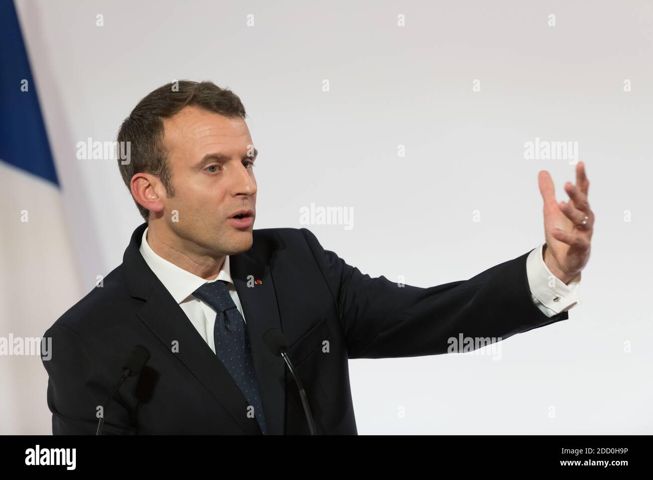 French President Emmanuel Macron looks on as he delivers his New Year ...