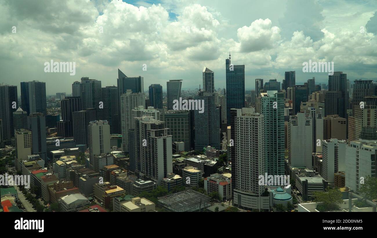 Manila city with skyscrapers, modern buildings and Makati business ...