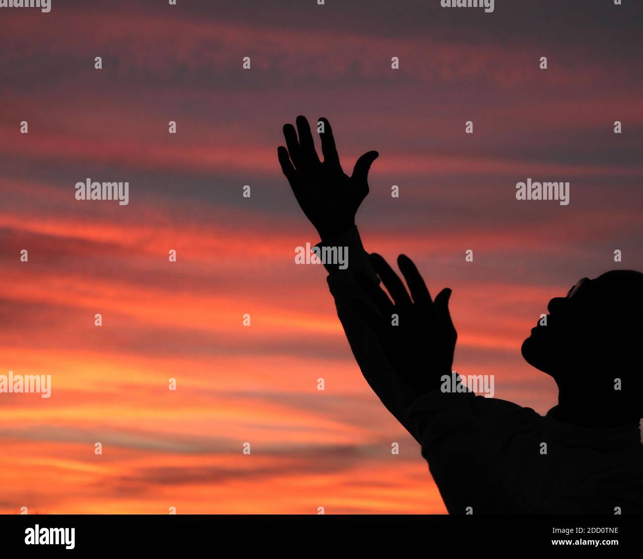 Man standing beach sky arms outstretched hi-res stock photography and ...