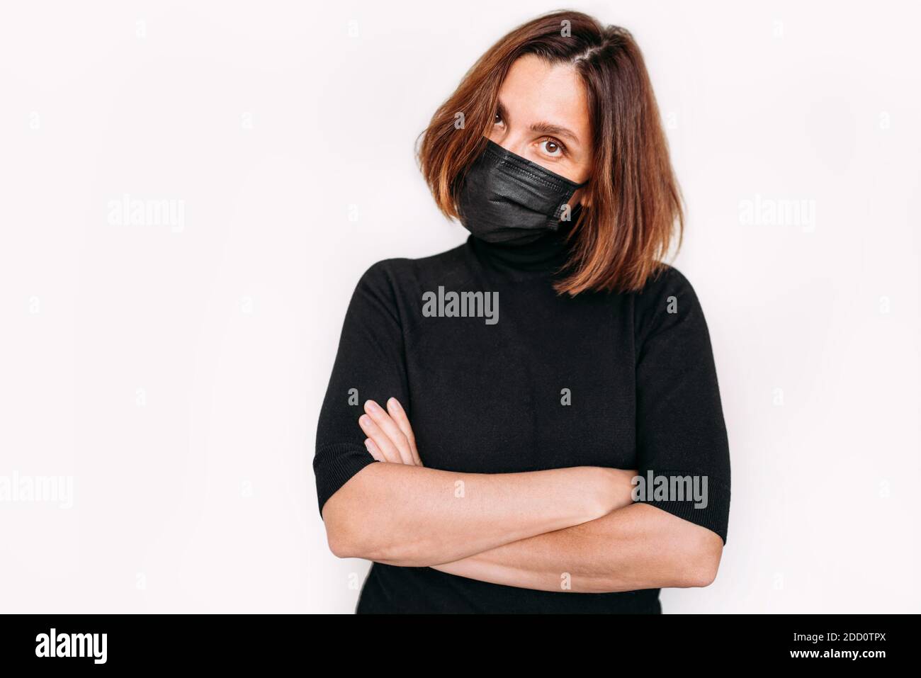 Woman in mask looking camera hi-res stock photography and images - Alamy