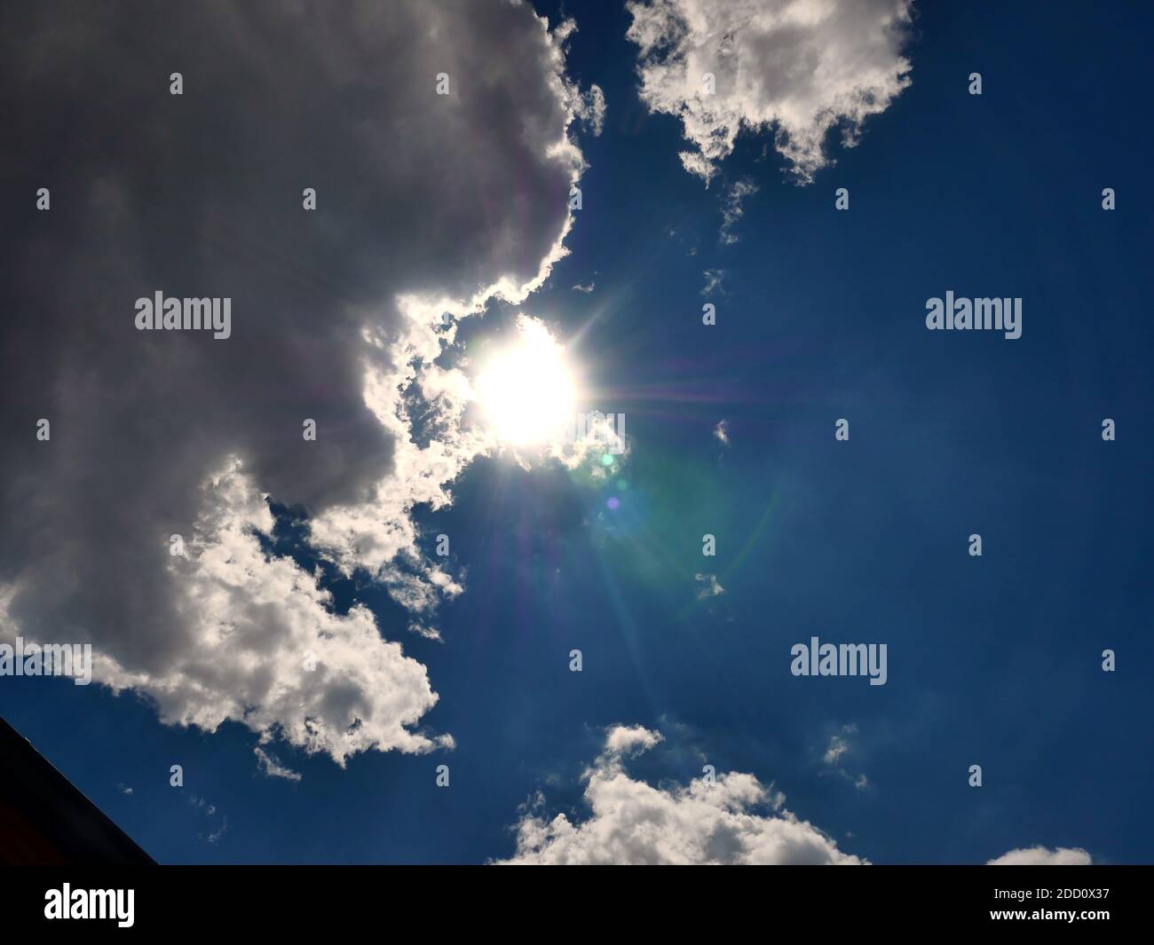 clouds blue sky sun ray light natural background Stock Photo - Alamy