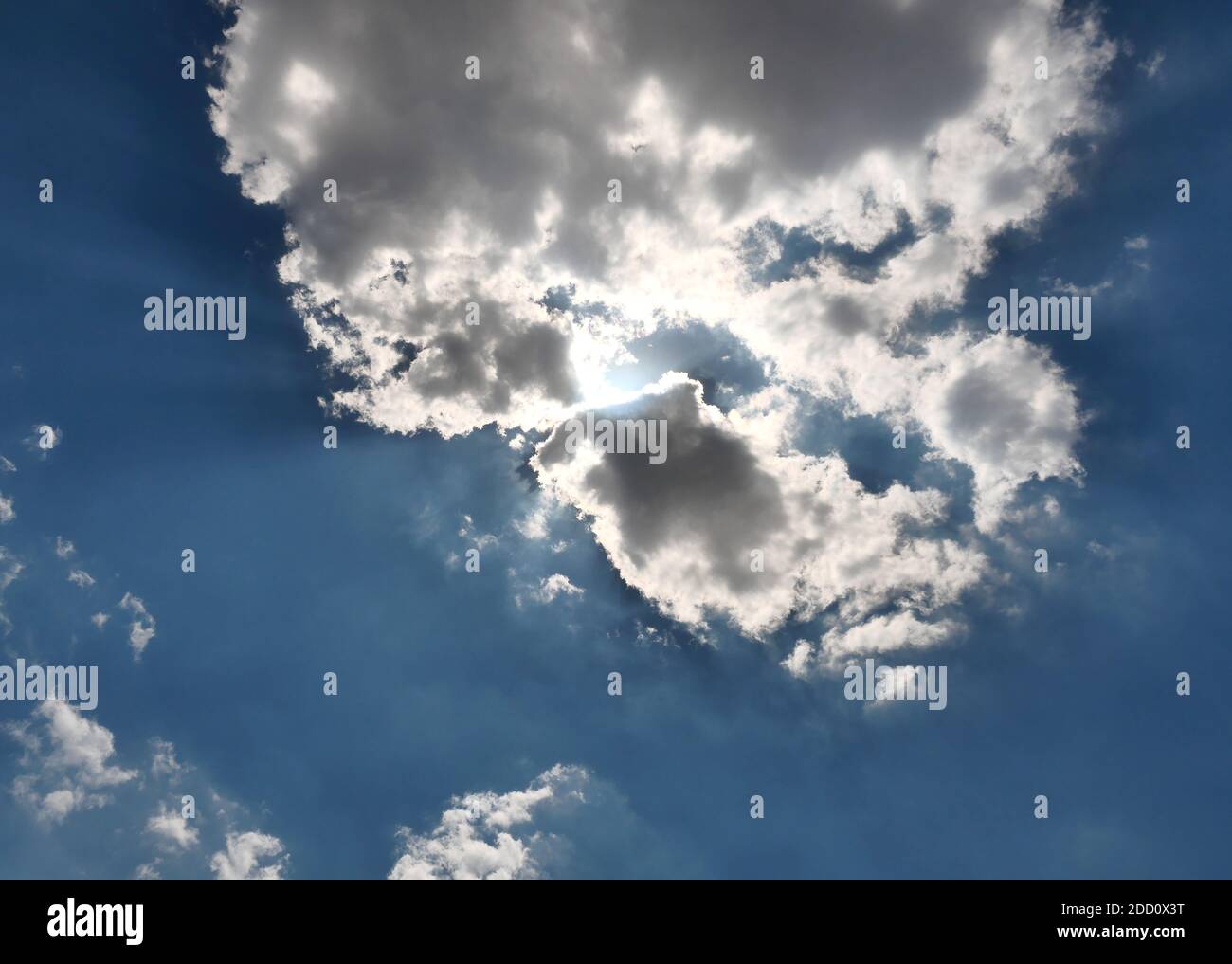 clouds blue sky sun ray light natural background Stock Photo - Alamy