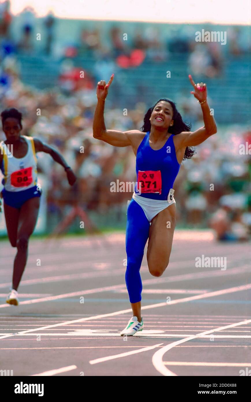 Florence Griffith Joyner competing in the 100m at the 1988 U.S. Olympic ...