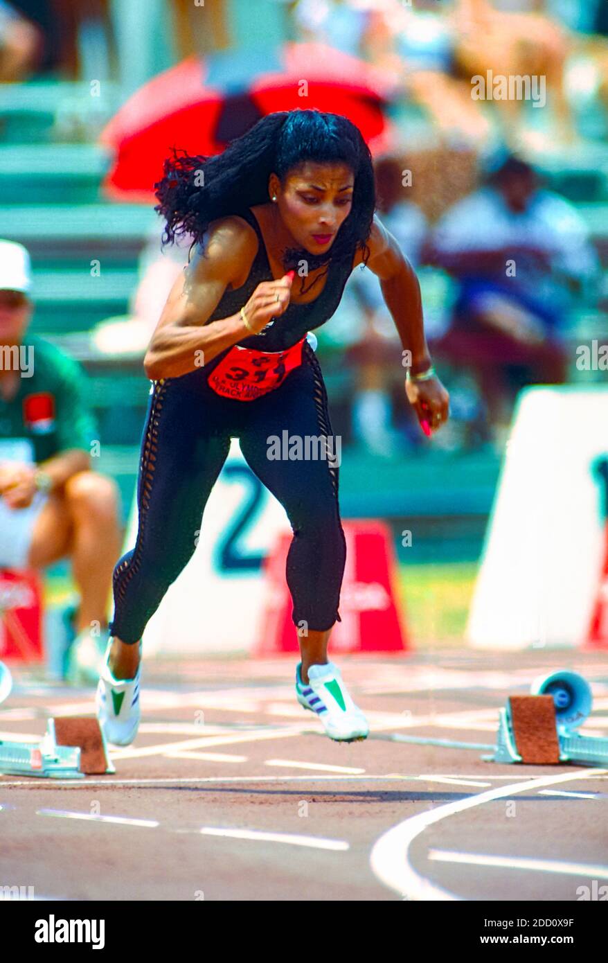 Florence Griffith Joyner competing in the 100m at the 1988 U.S. Olympic ...