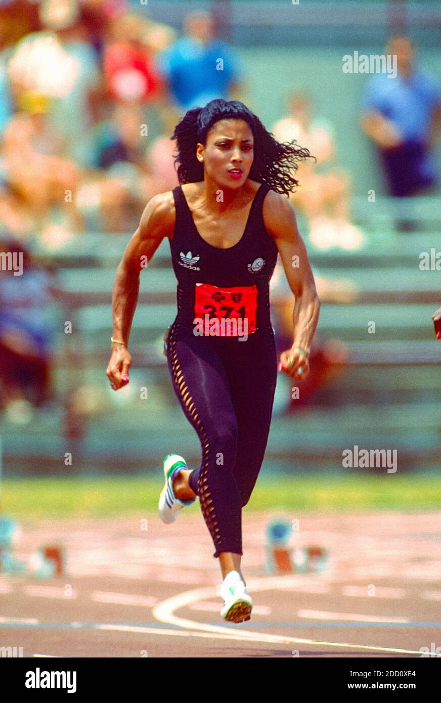 Florence Griffith Joyner competing in the 100m at the 1988 U.S. Olympic ...