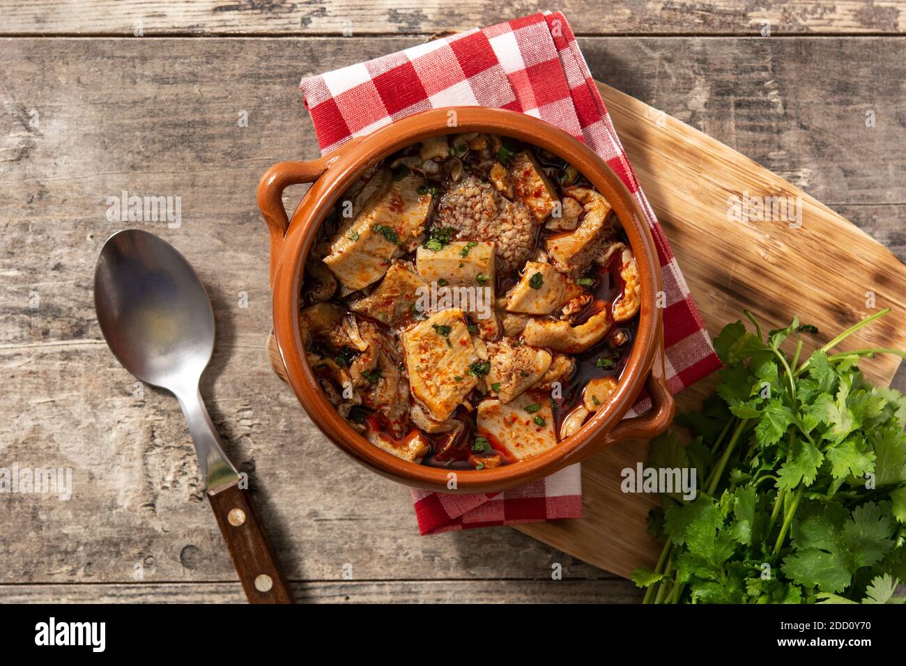 Traditional mondongo or el menudo soup on wooden table Stock Photo - Alamy
