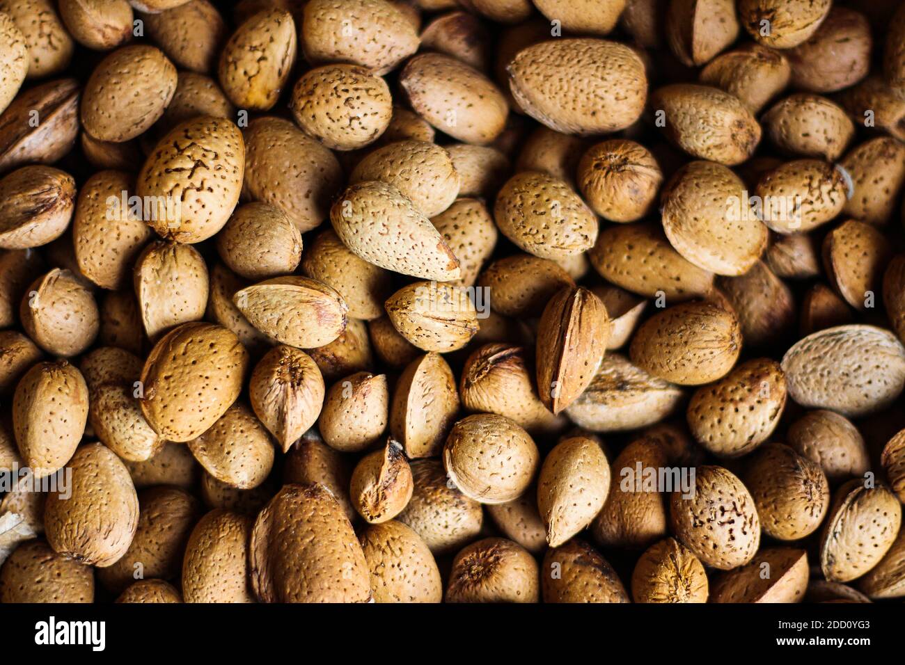 Almonds, plenty. background Stock Photo - Alamy