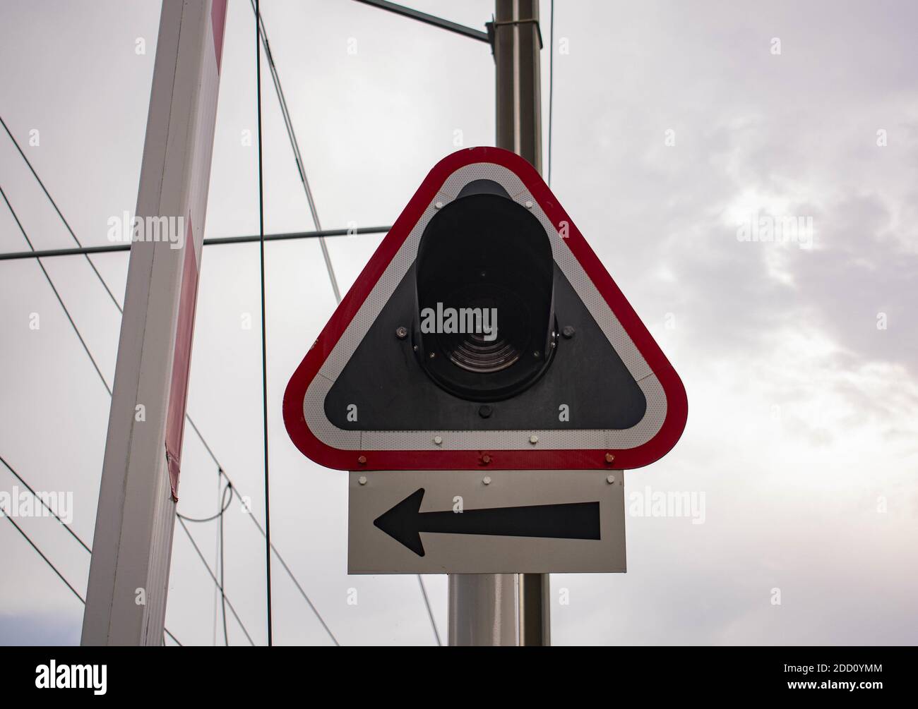 A closeup low angle shot of a turned-off traffic light inside of a ...