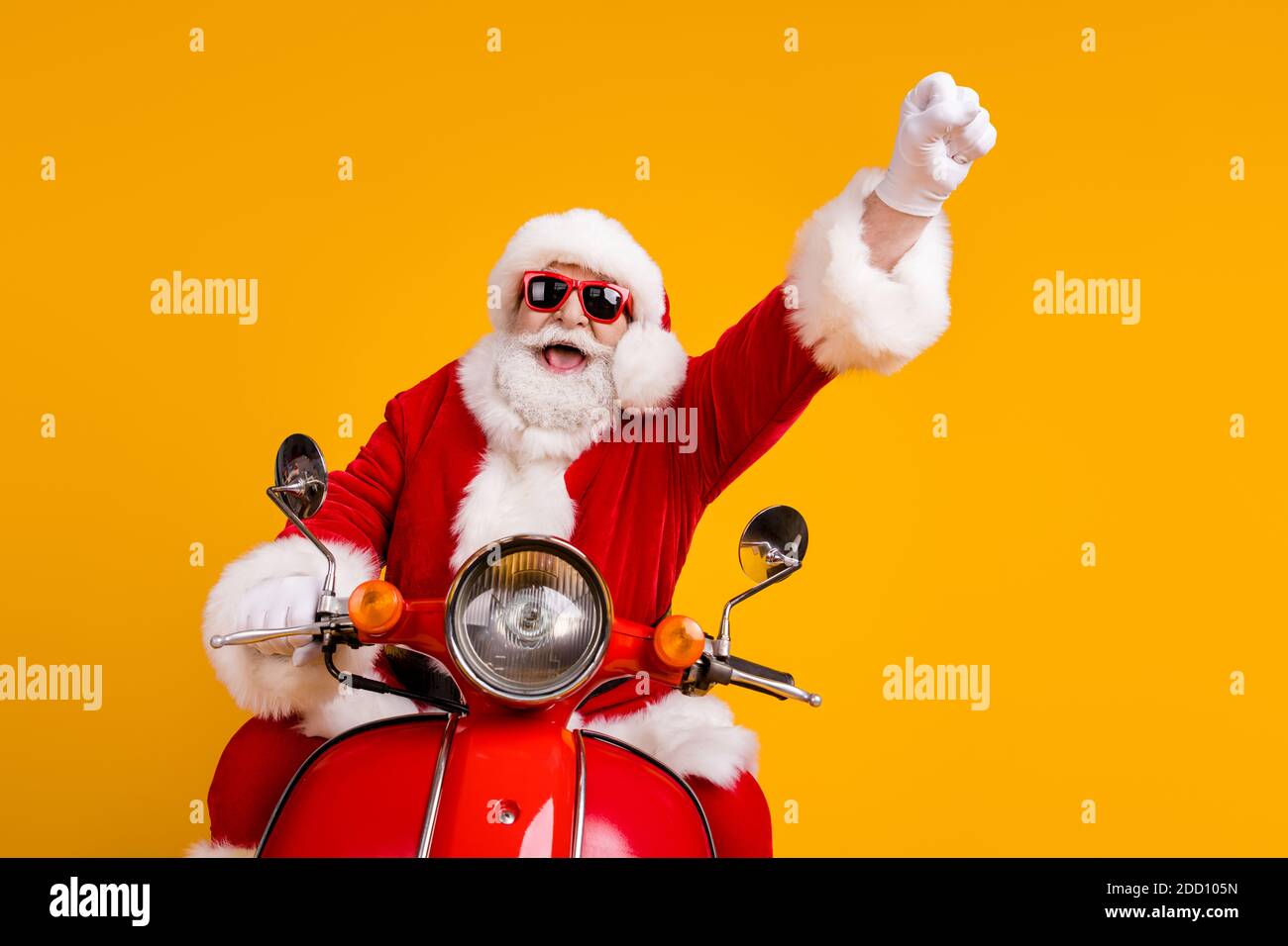 Portrait of his he nice funny cheerful cheery Santa riding moped fast ...
