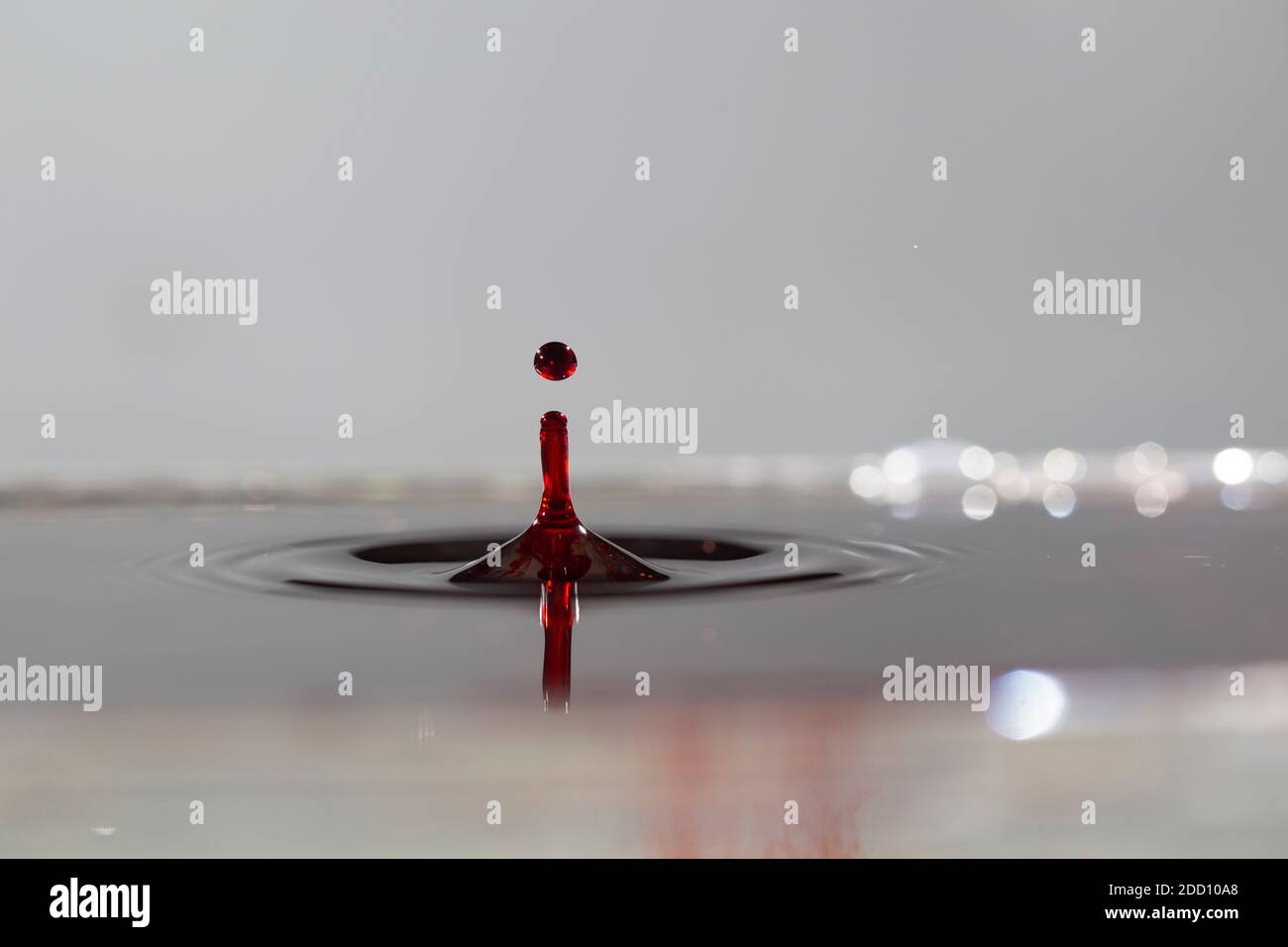 Red Water Droplet Stock Photo - Alamy