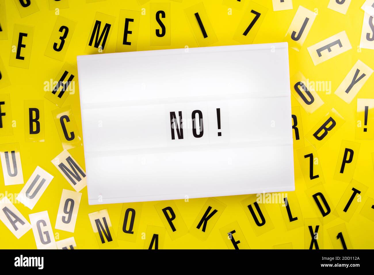 No! word on lightbox on scattered letters background of plastic ...