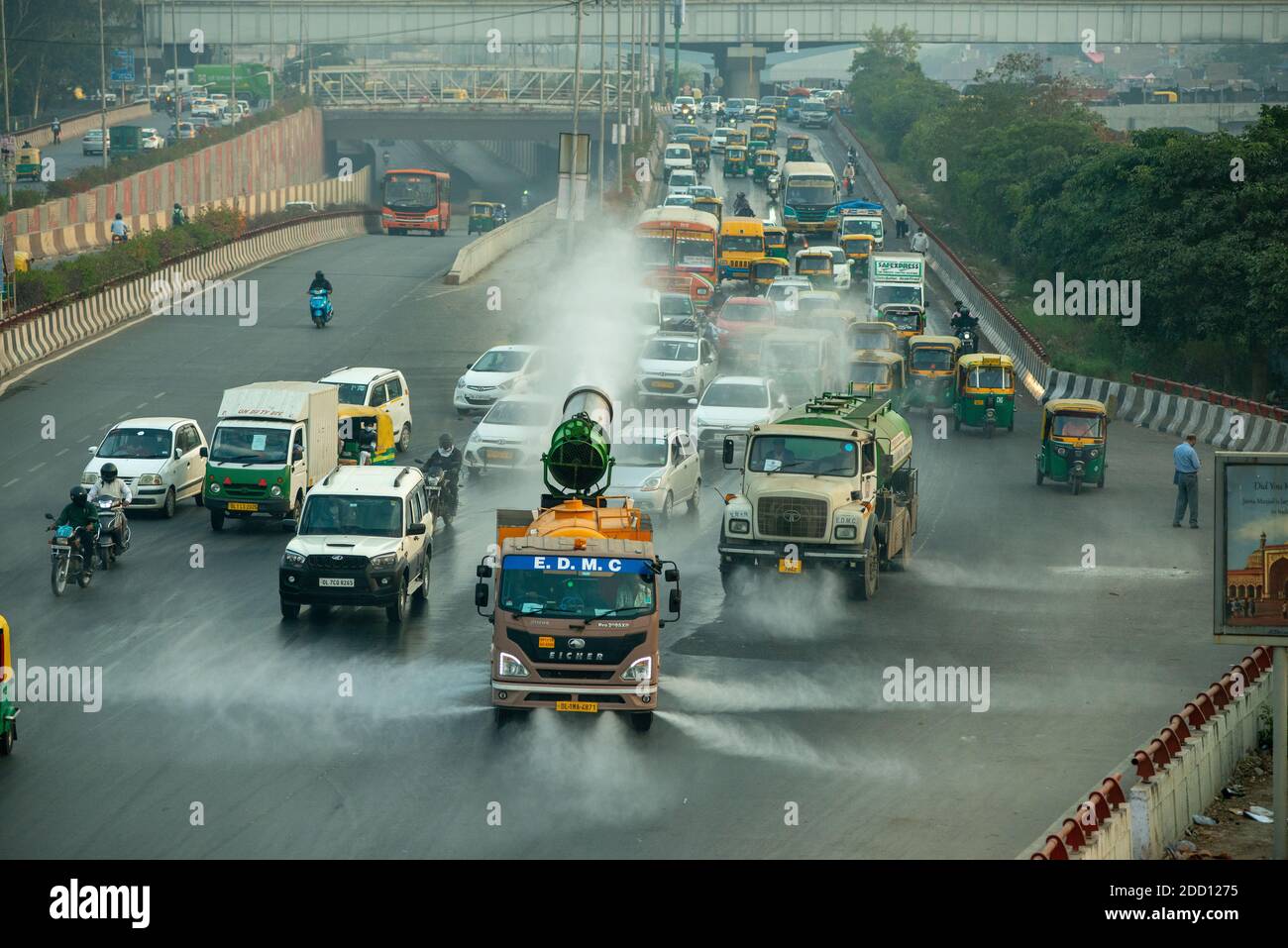 New Delhi, India. 23rd Nov, 2020. Anti smog gun vehicle sprays water on ...