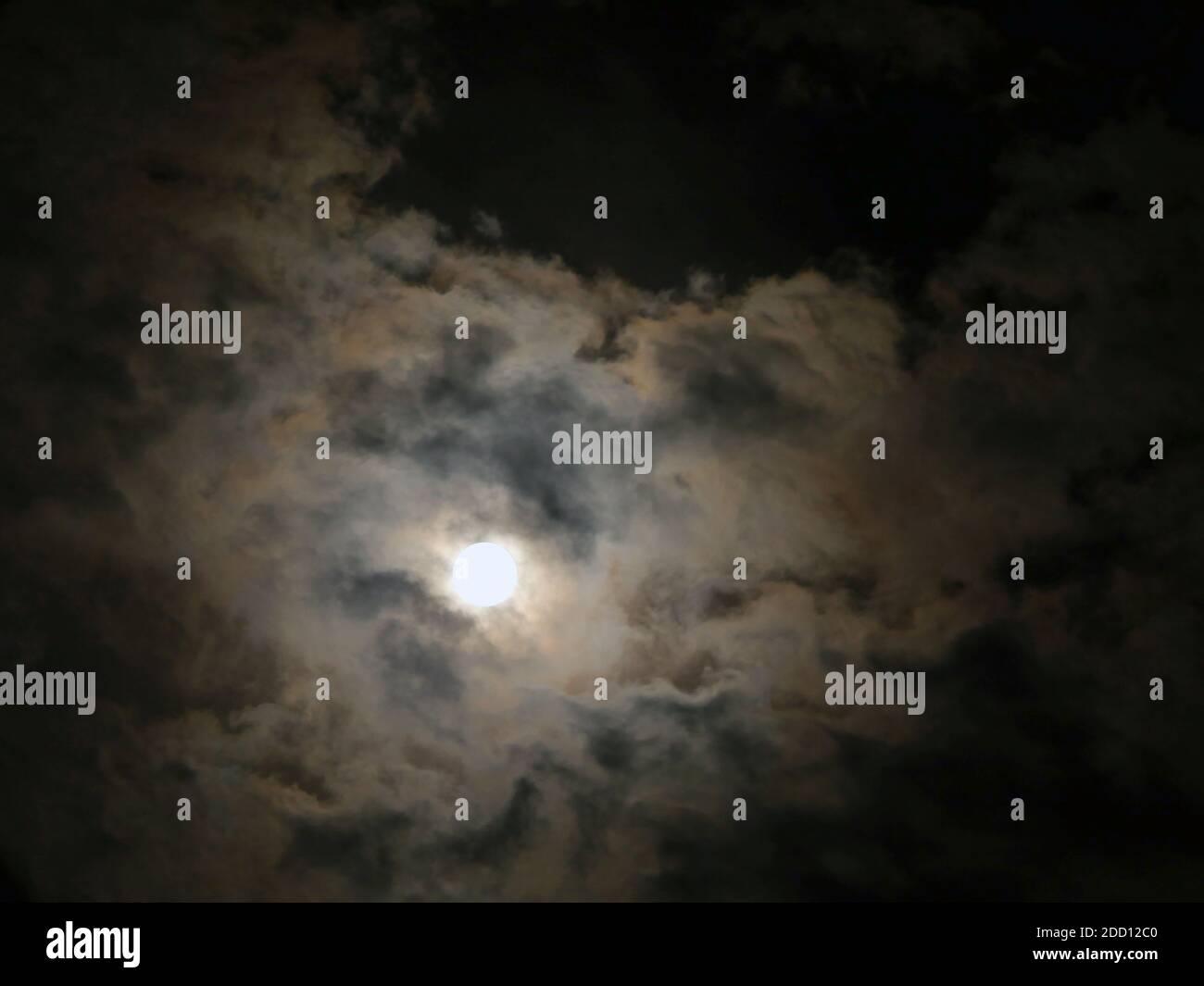 full moon at night sky clouds Stock Photo - Alamy