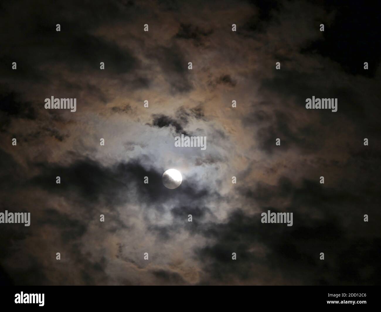 full moon at night sky clouds Stock Photo - Alamy