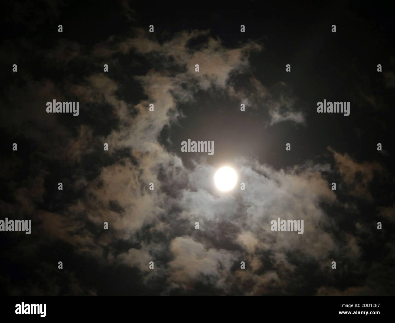 full moon at night sky clouds Stock Photo - Alamy