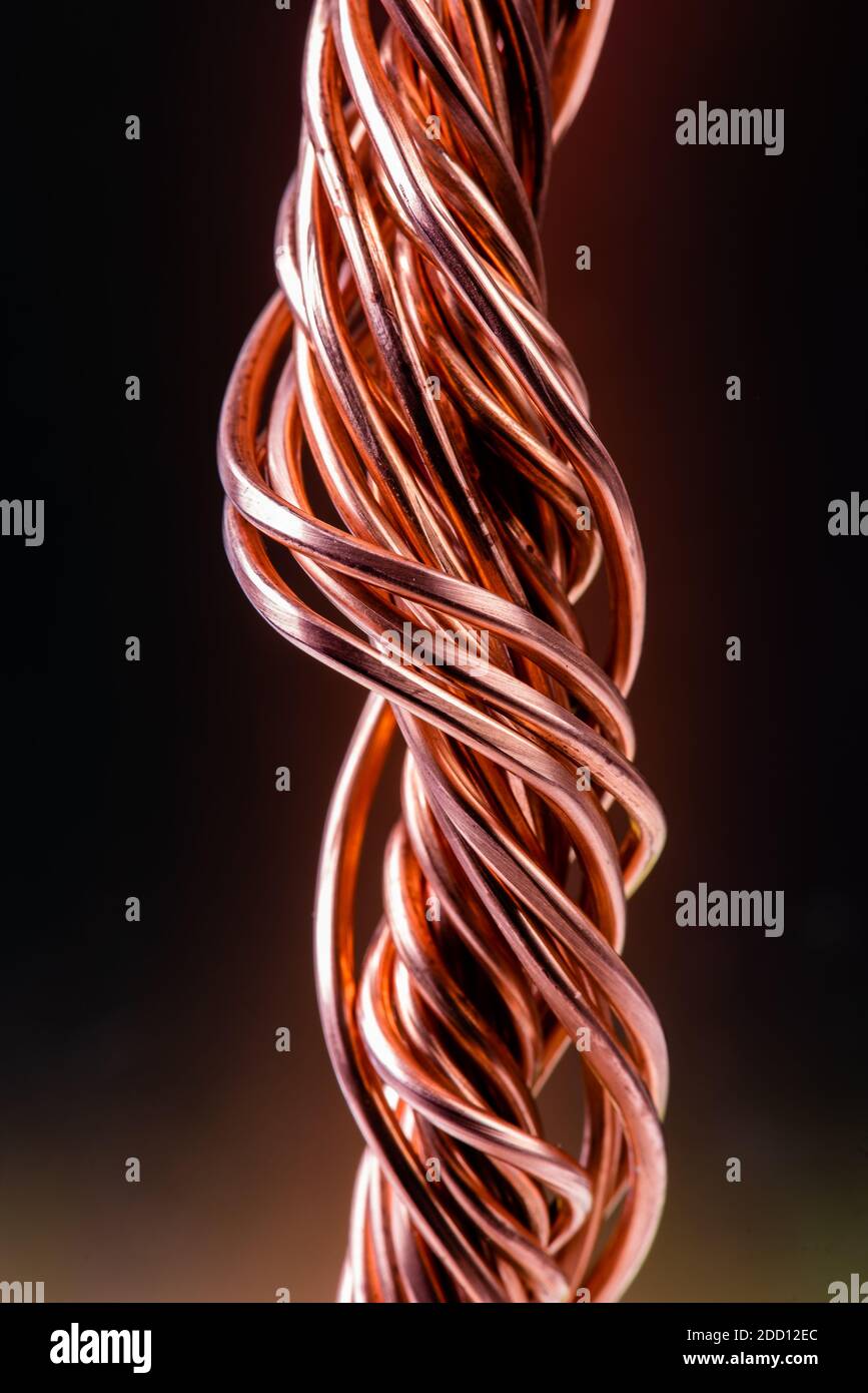 Copper industry, swirl of pure cu wire close-up Stock Photo - Alamy