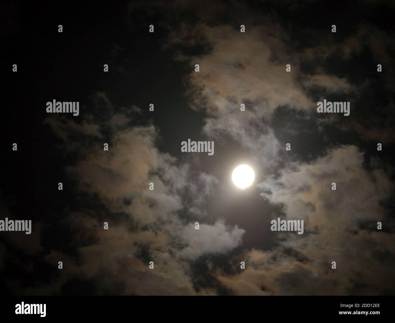 full moon at night sky clouds Stock Photo - Alamy