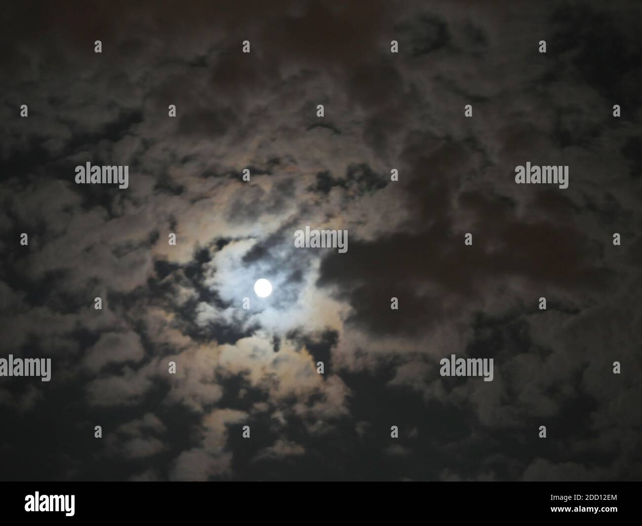 full moon at night sky clouds Stock Photo - Alamy