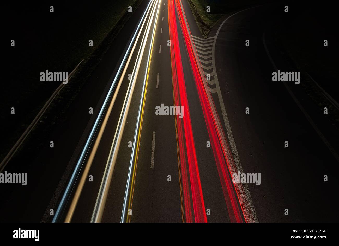Top view of vehicle car light trails on highway road in red and white ...