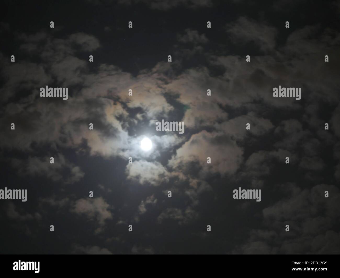 full moon at night sky clouds Stock Photo - Alamy