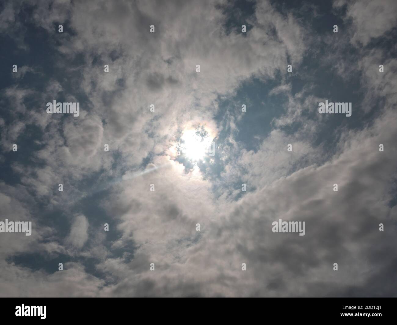 clear clouds blue sky sun ray landscape Stock Photo - Alamy