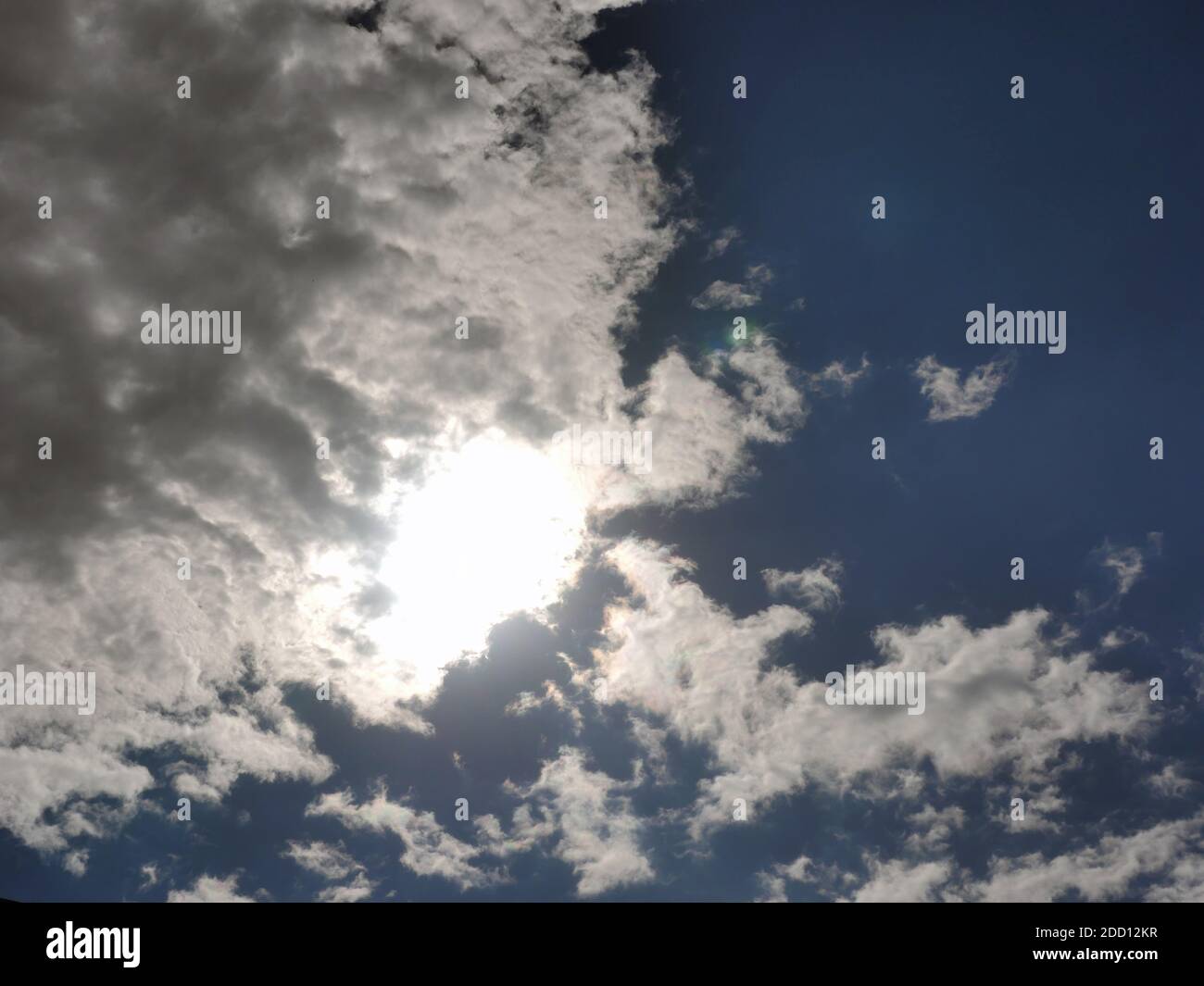 clear clouds blue sky sun ray landscape Stock Photo - Alamy