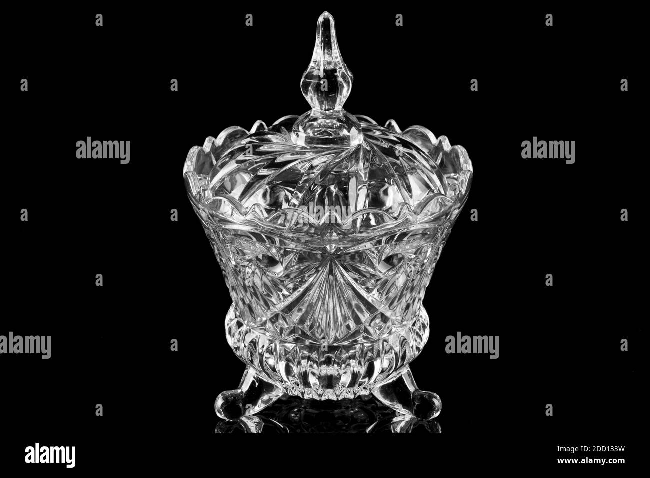 elegant crystal container on a black background Stock Photo - Alamy
