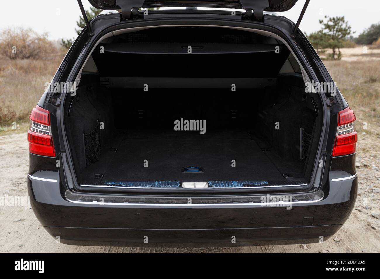 Car parked on the road in the forest, travel stop, open trunk Stock ...
