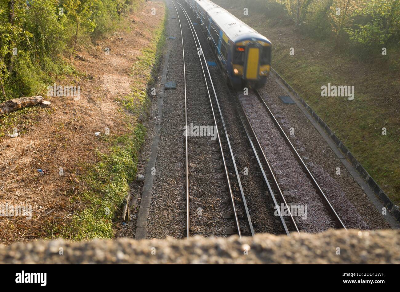 View of the London to Whitstable mainline railway line from a bridge at ...
