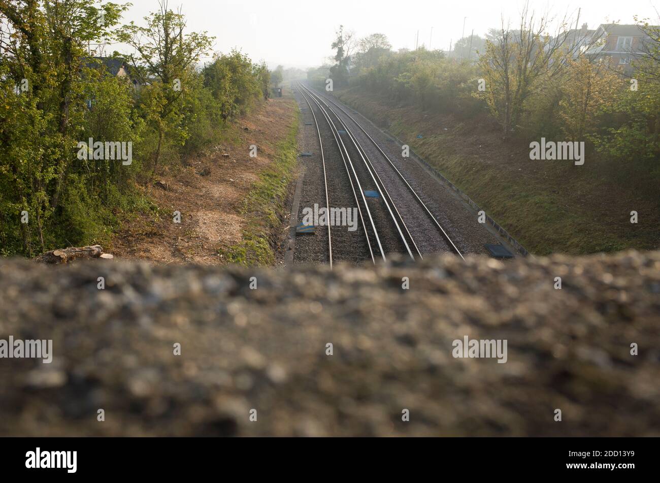 View of the London to Whitstable mainline railway line from a bridge at ...