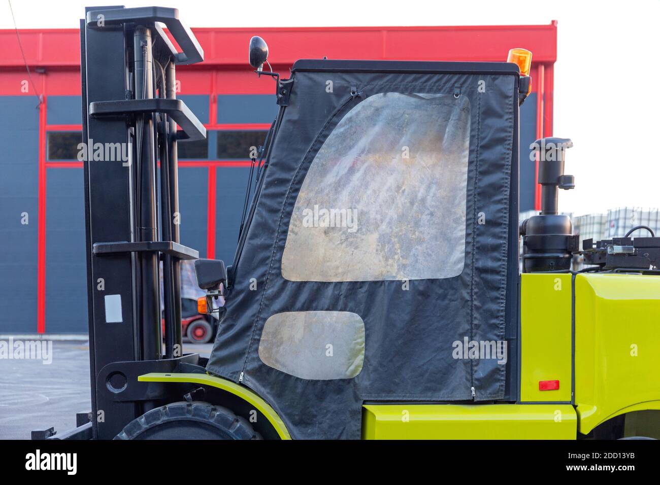 Winterize Forklift Cabin in Front of Warehouse Building Stock Photo - Alamy
