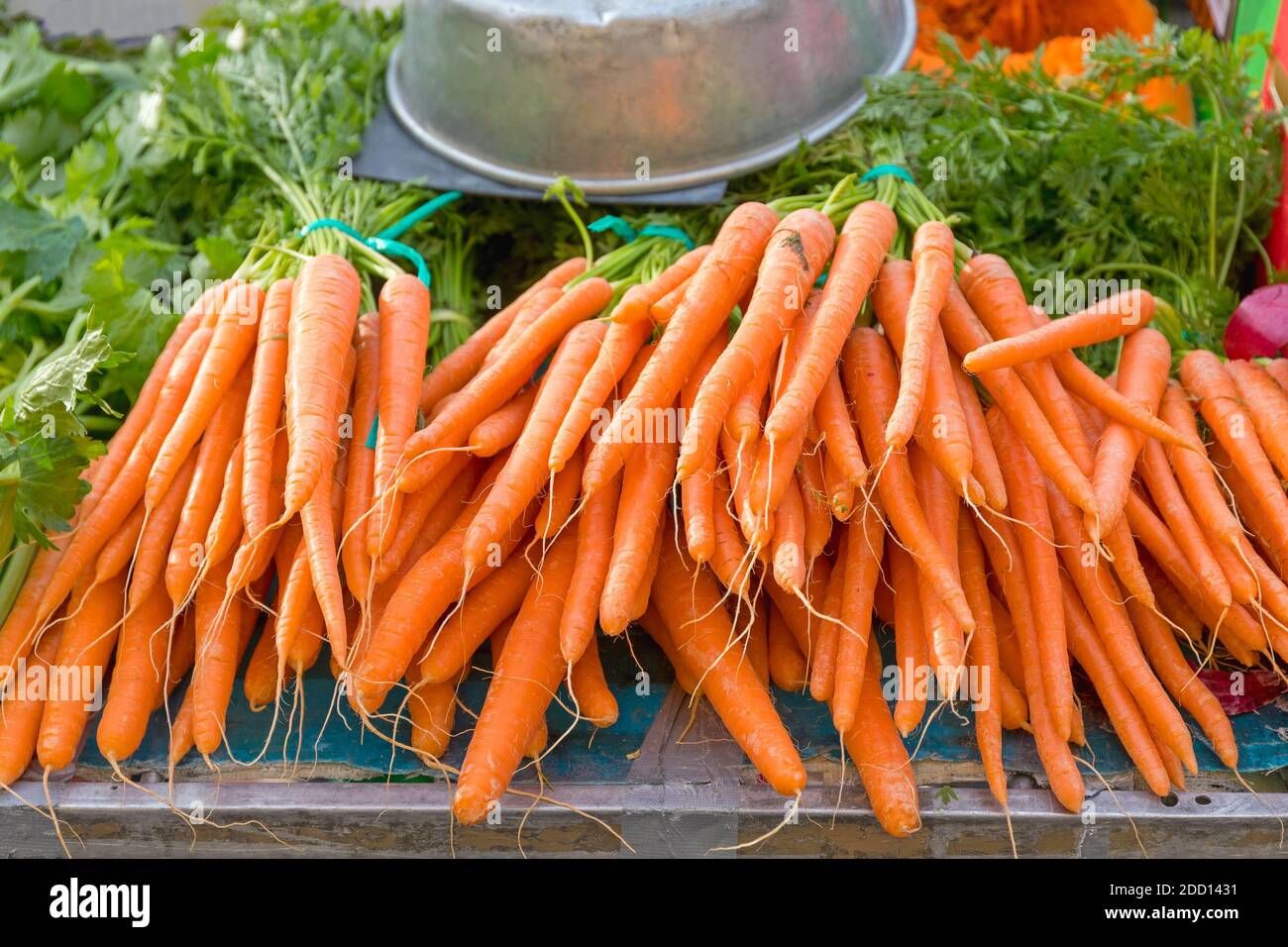 Bunch of Fresh Carrots at Farmers Market Stock Photo - Alamy