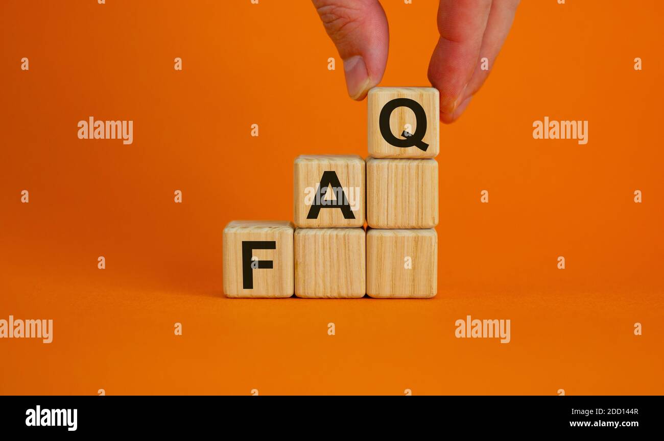 Concept word 'FAQ, frequently asked questions' on cubes on a beautiful ...