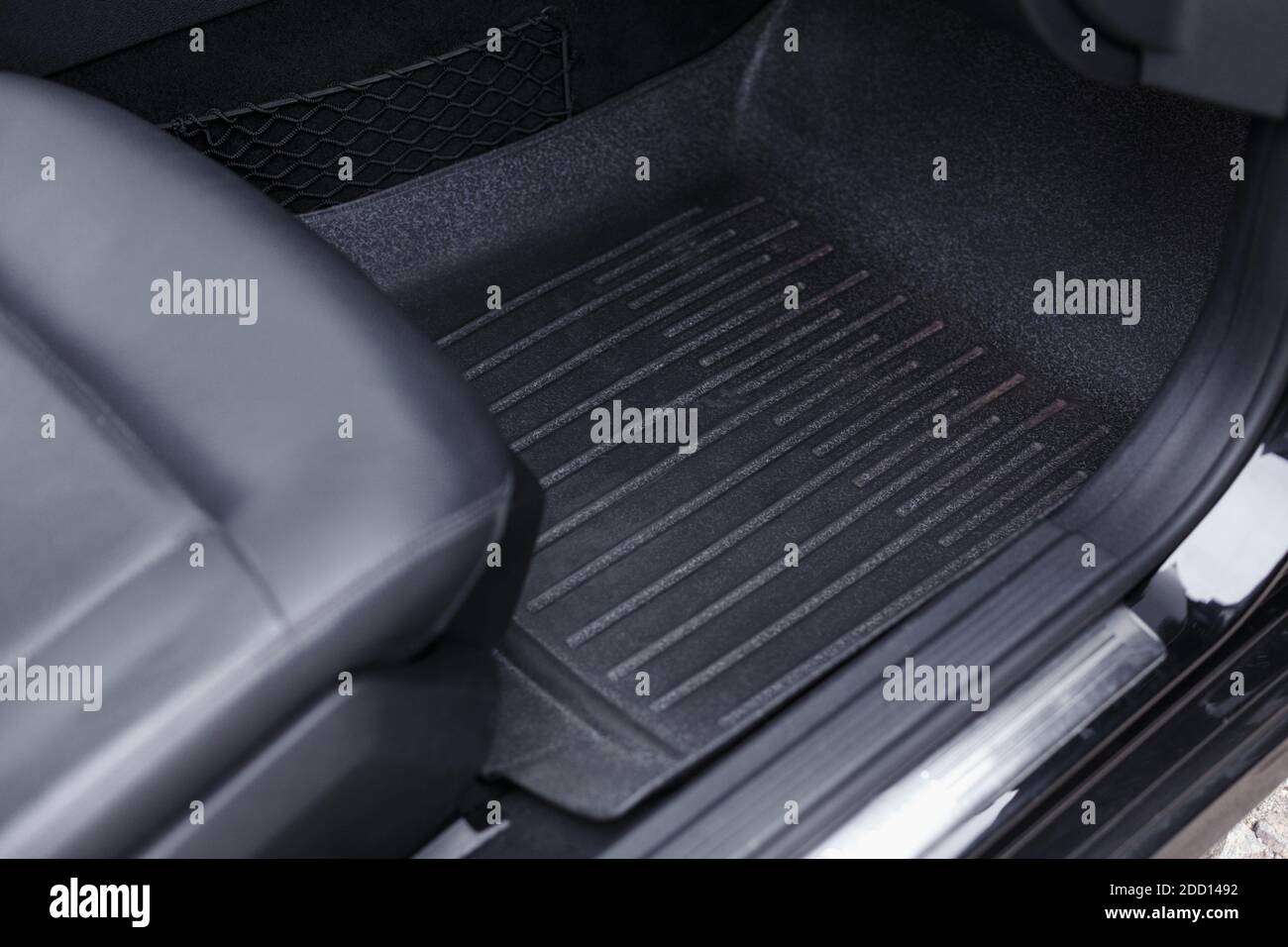 Car inside, passenger foot mat Stock Photo - Alamy