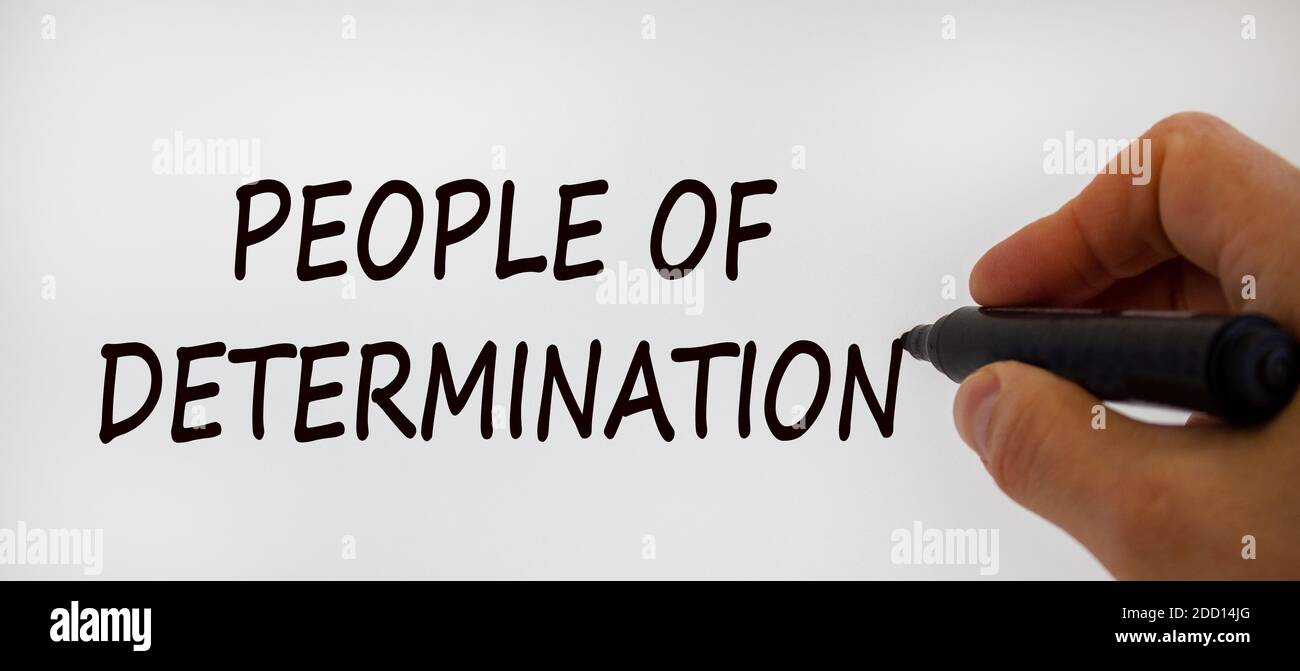 People of determination. Hand writing words 'people of determination ...